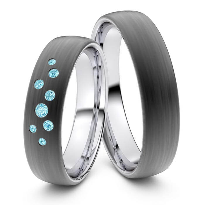 Ausgefallene Eheringe: Gold, Schwarz oder Motive toll kombiniert